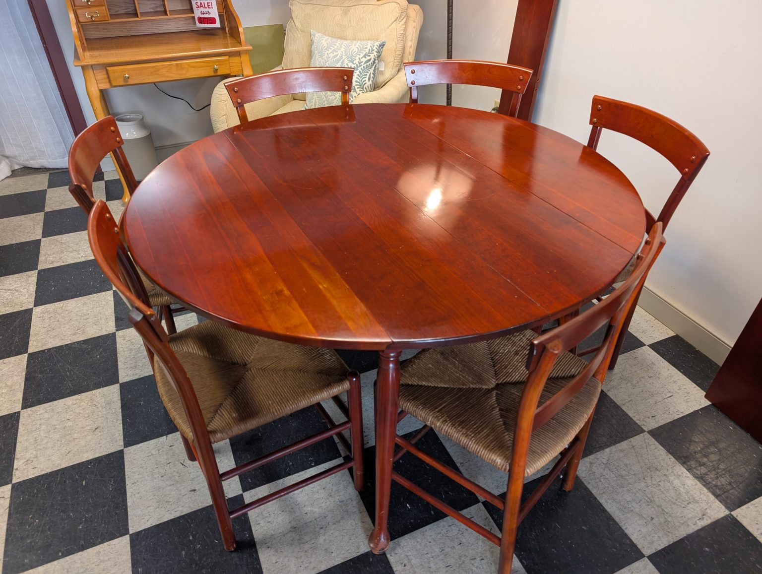 Round Cherry Table with Rush Seat Chairs | Roth & Brader Furniture